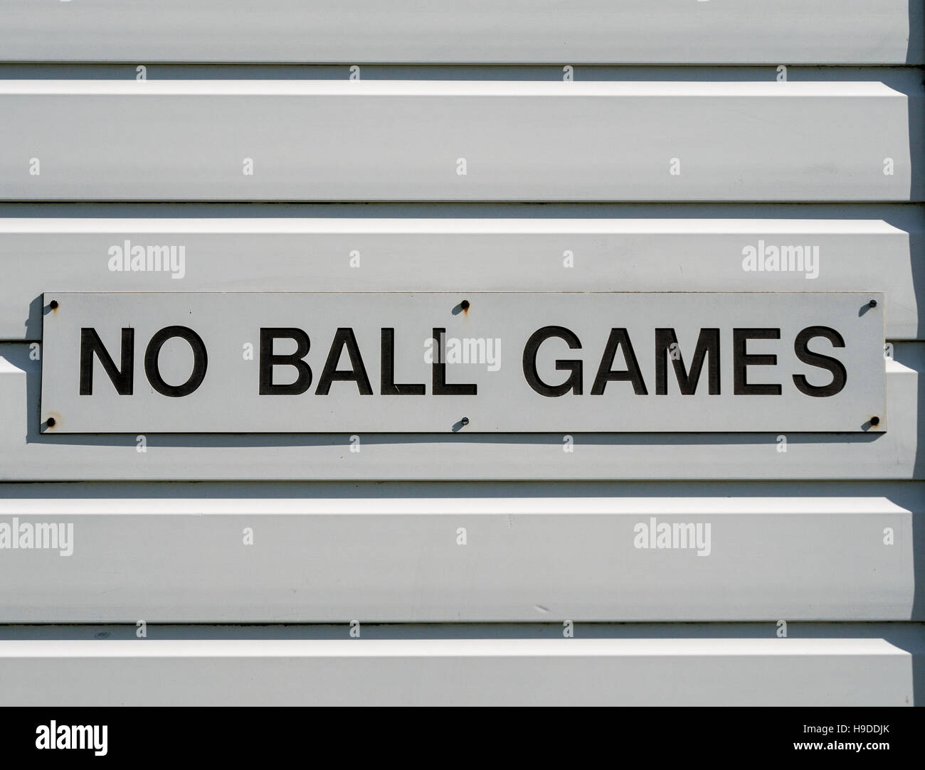 No Ball Games Sign on Building Stock Photo - Alamy
