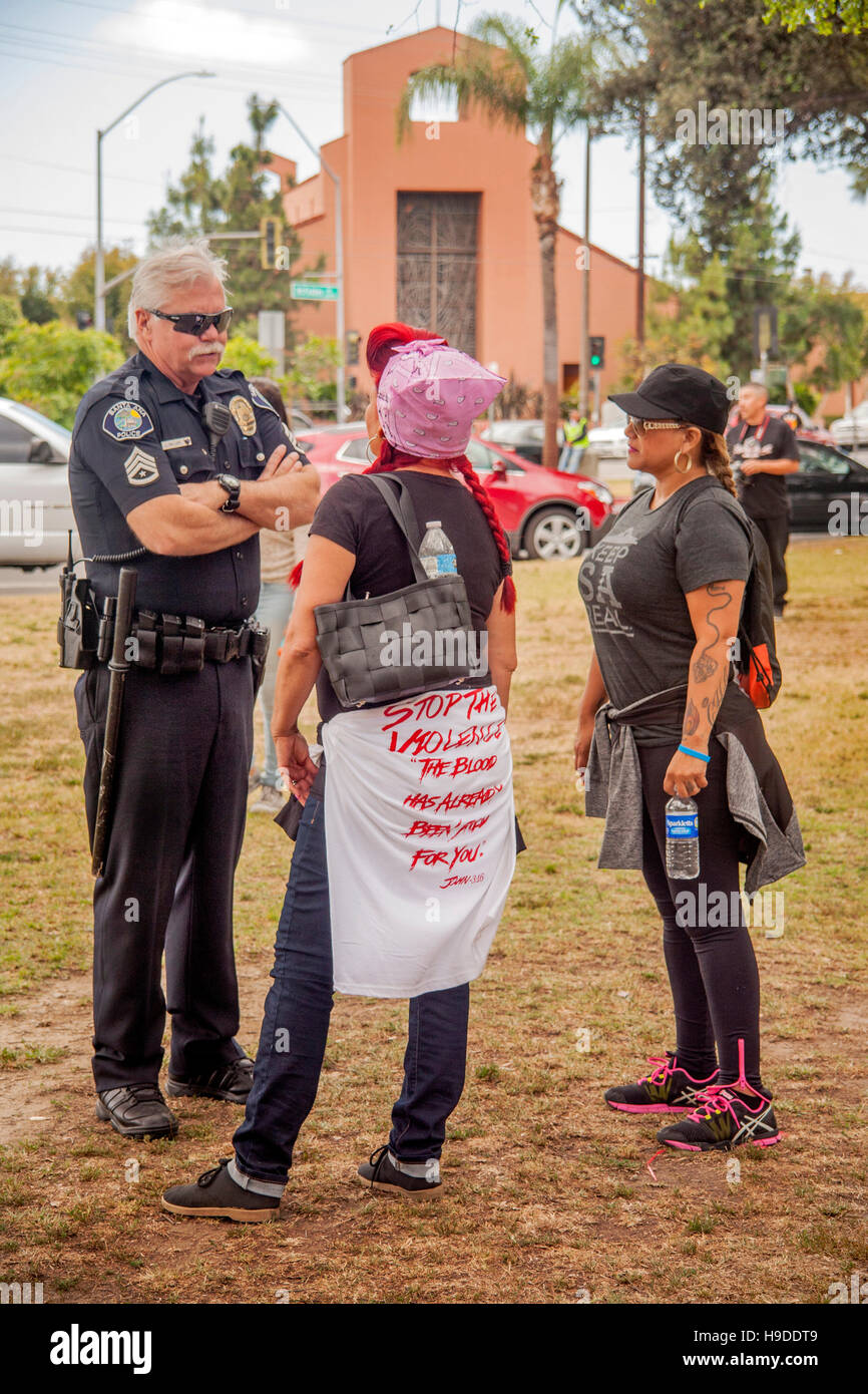 Hispanic young female police officer hi-res stock photography and ...