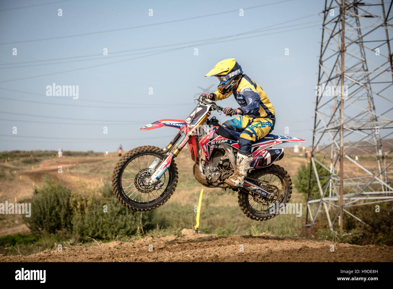 motocross rider in the race Stock Photo - Alamy