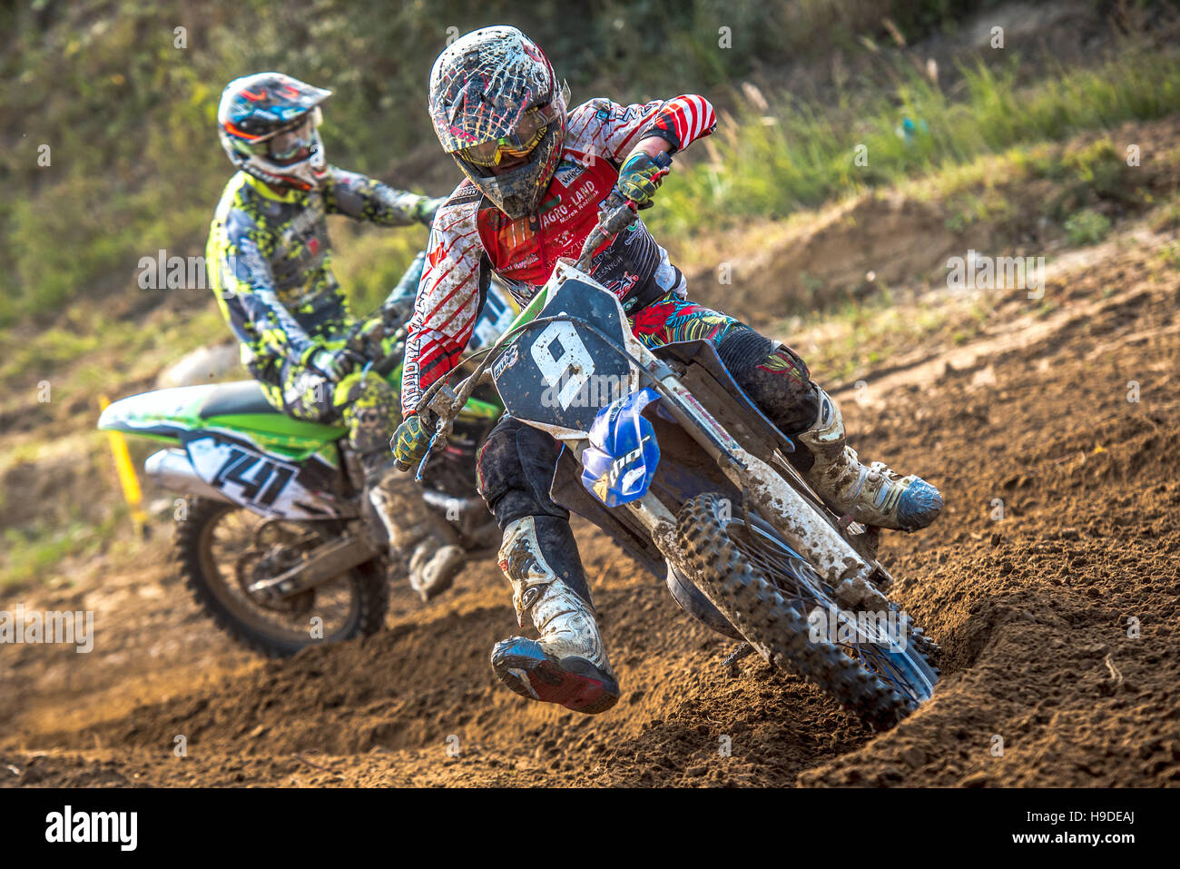motocross rider in the race Stock Photo - Alamy