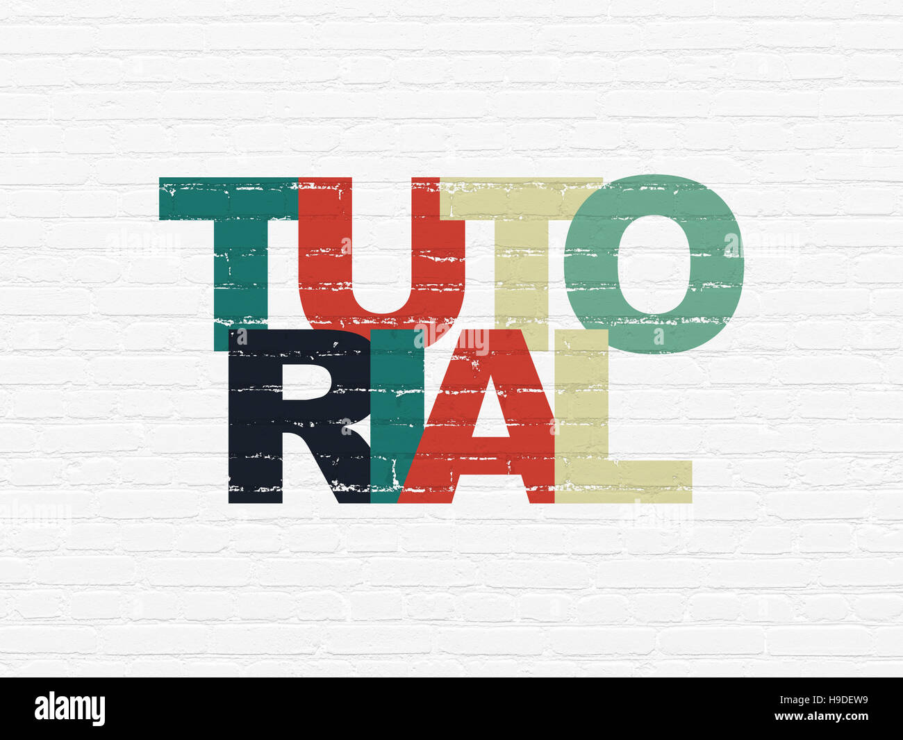 Education concept: Tutorial on wall background Stock Photo - Alamy