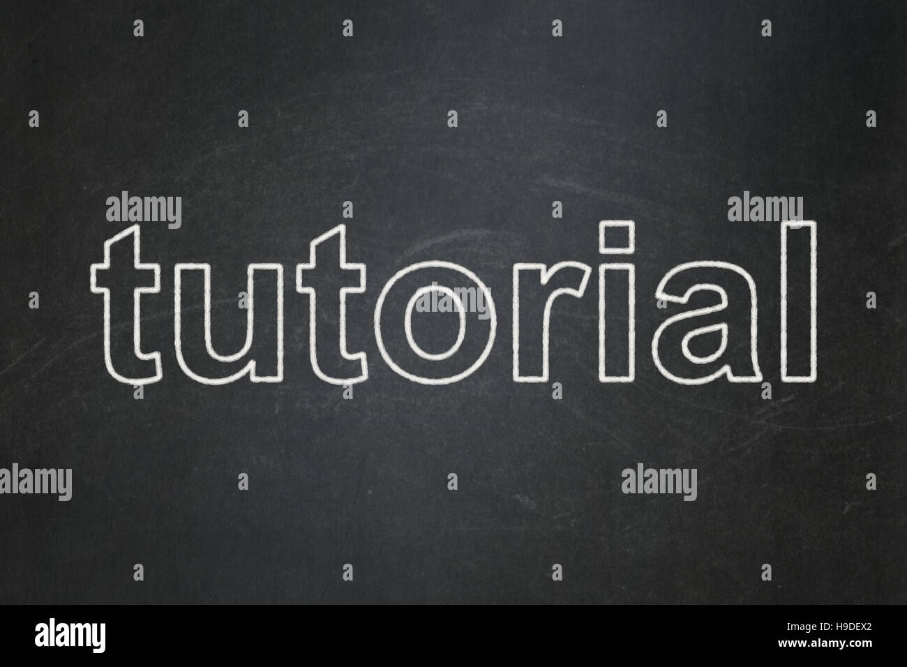 Education concept: Tutorial on chalkboard background Stock Photo - Alamy