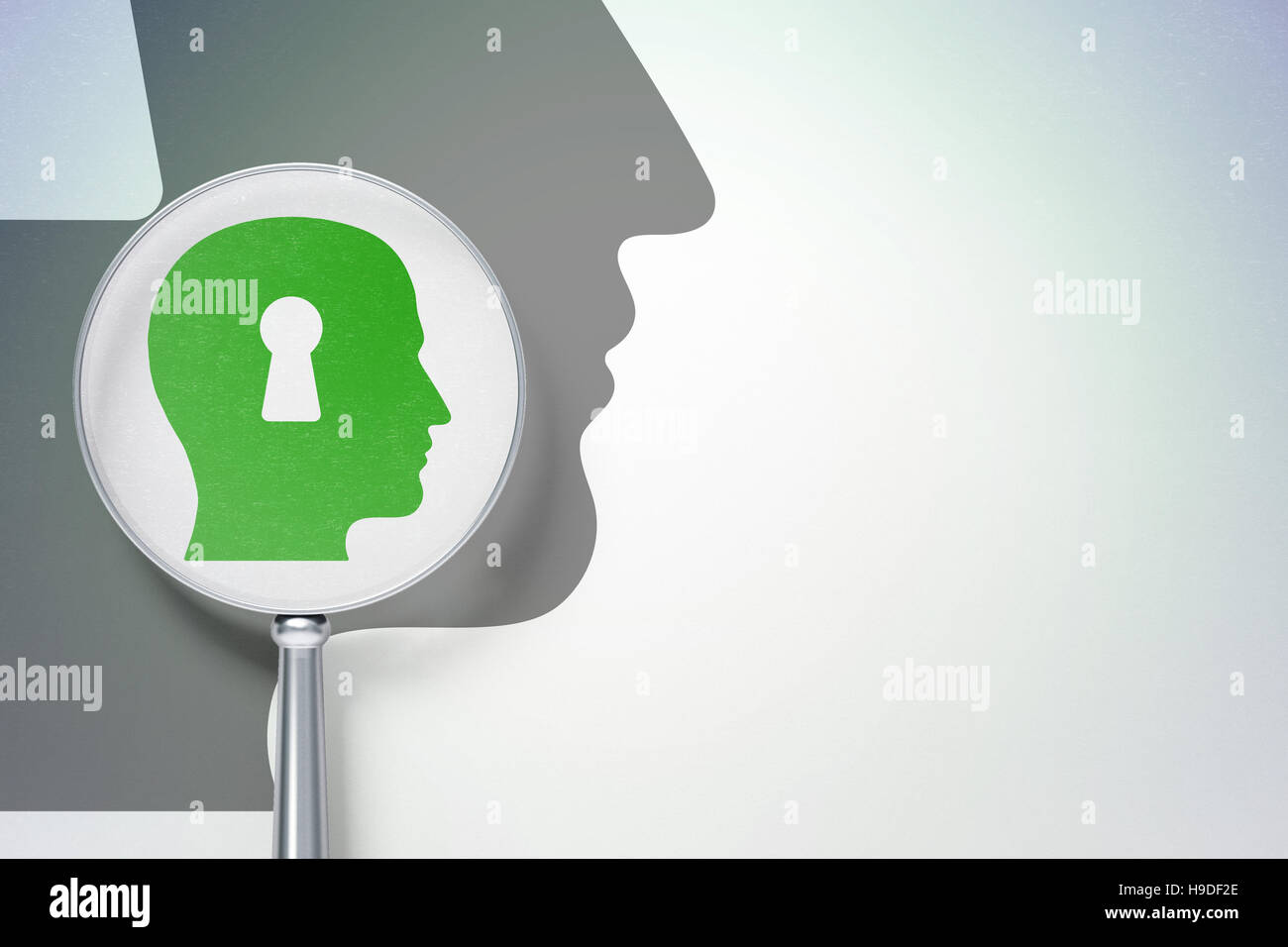 Advertising concept: Head With Keyhole with optical glass on digital ...