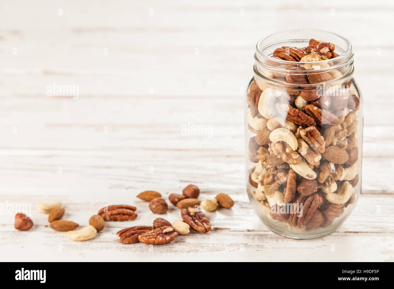 Mix of different nuts closeup photo Stock Photo - Alamy