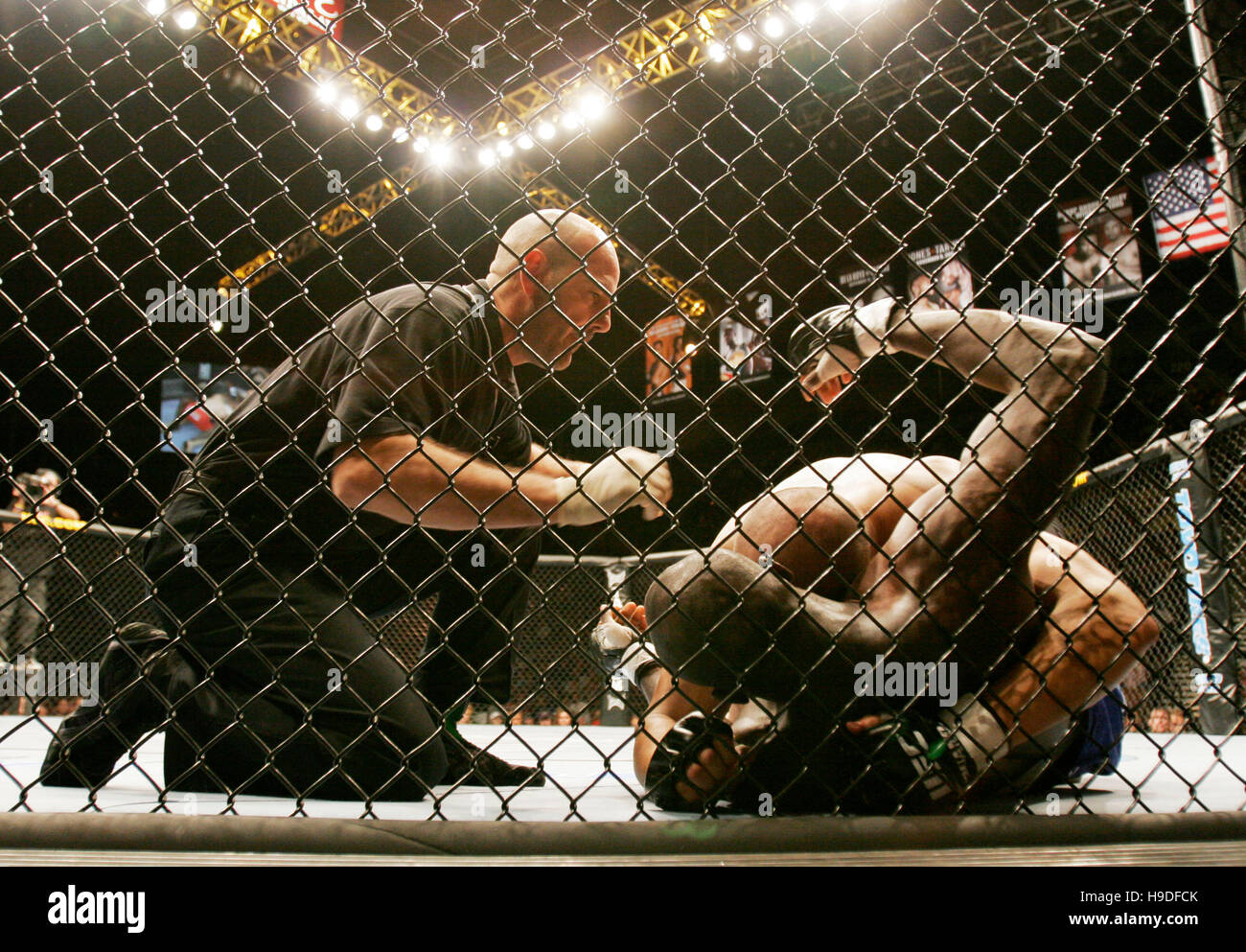 Cheick Kongo of France, bottom, fights Carmelo Marrero at the Ultimate ...