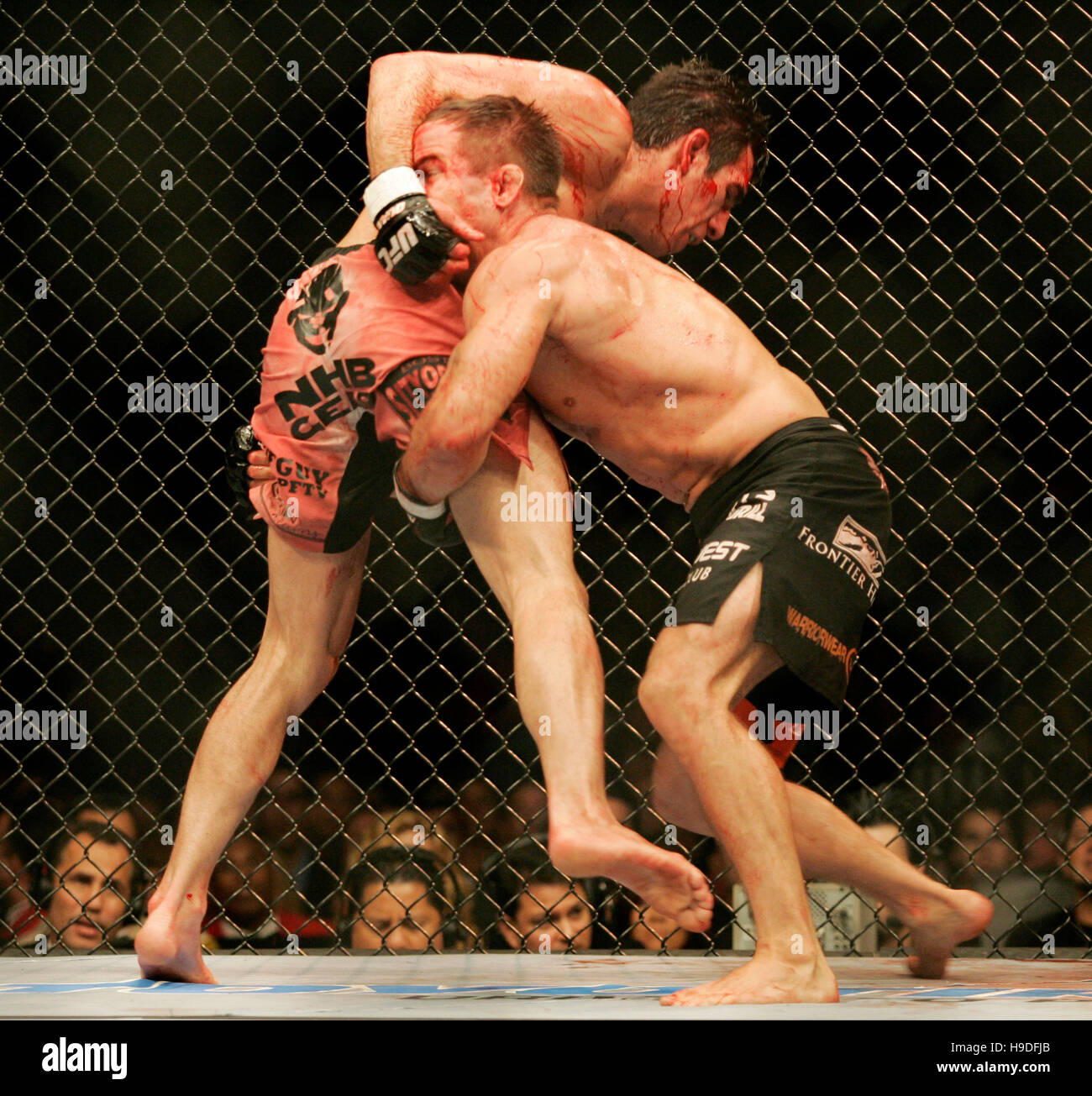 Sean Sherk, right, fights Kenny Florian at the Ultimate Fighting ...