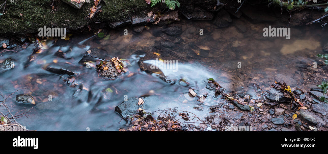 Water over pebbles Stock Photo - Alamy