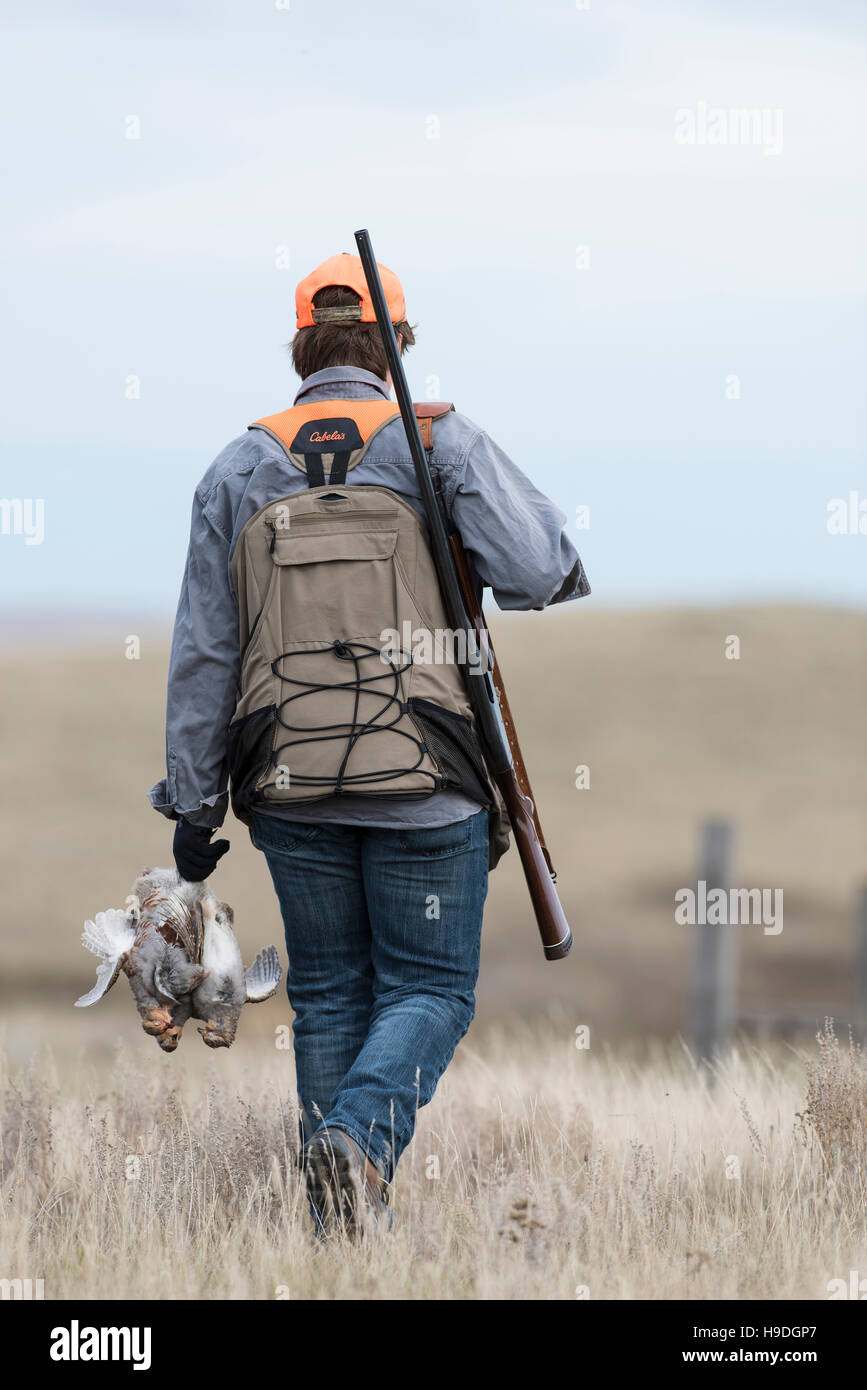A hunter with Hungarian Partridge Stock Photo - Alamy