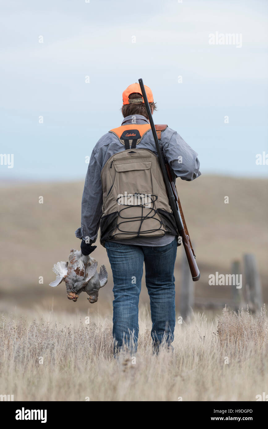 A hunter with Hungarian Partridge Stock Photo - Alamy