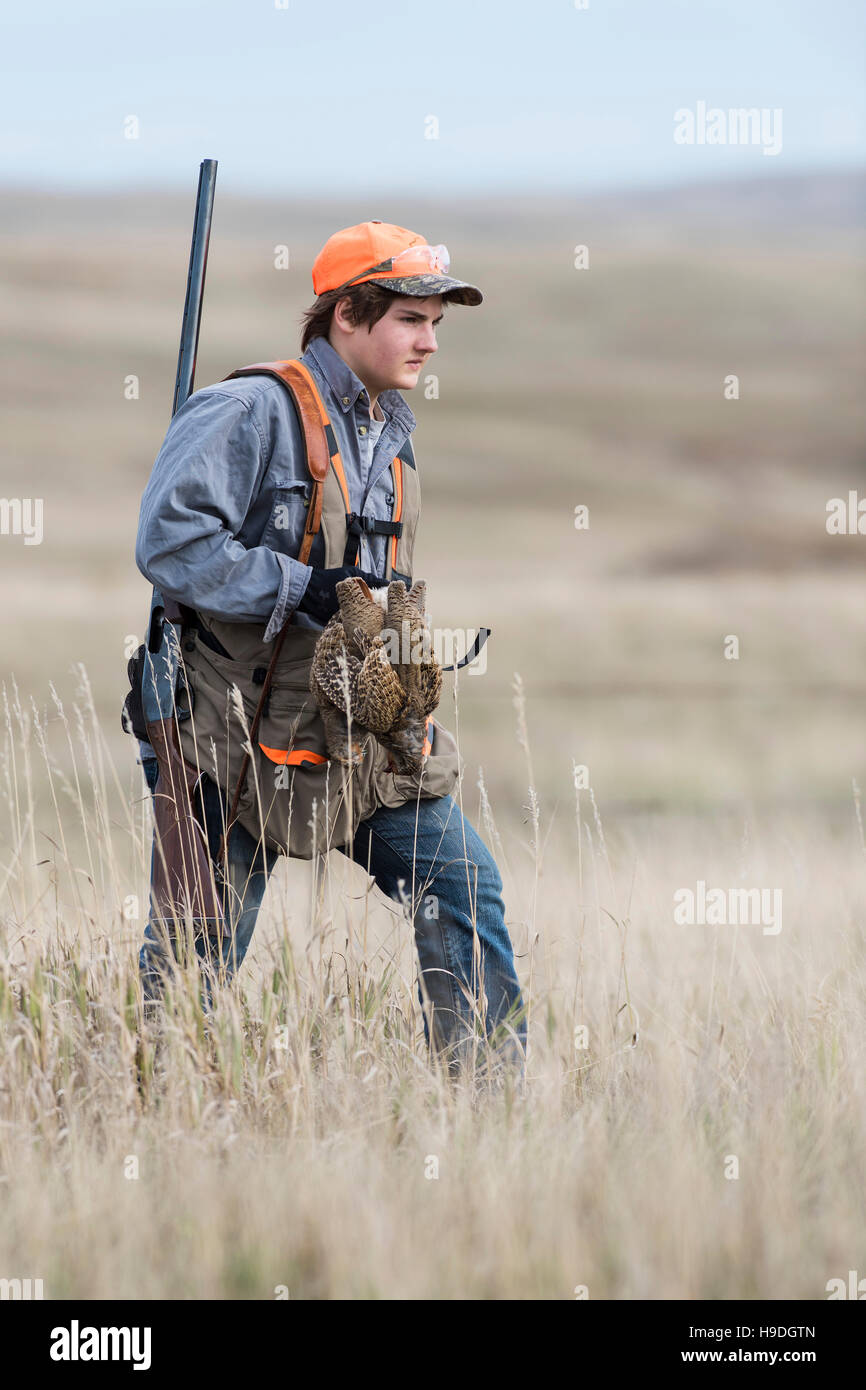 A hunter with Hungarian Partridge Stock Photo - Alamy