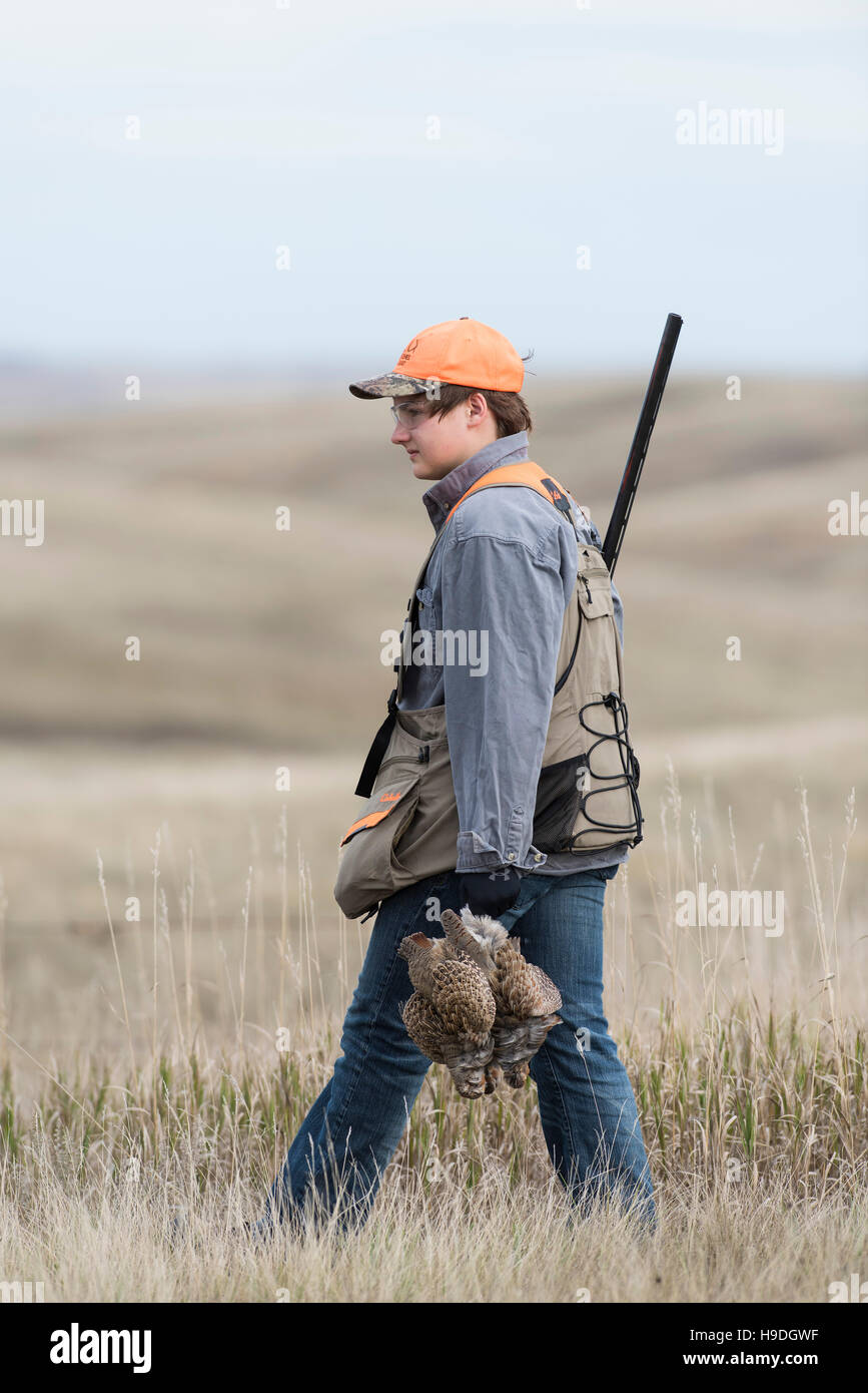 A hunter with Hungarian Partridge Stock Photo - Alamy
