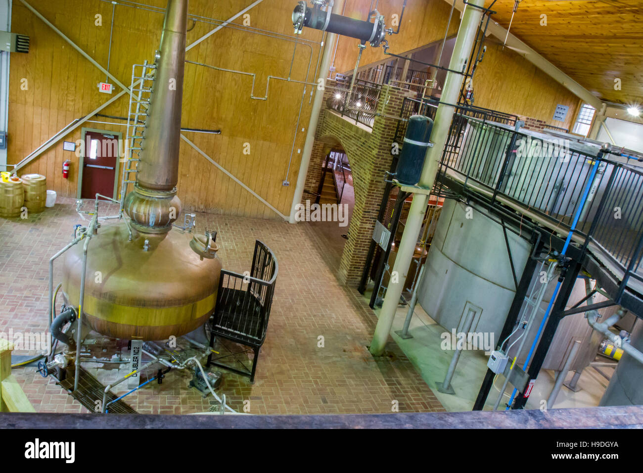 Large copper still inside craft bourbon distillery Stock Photo - Alamy