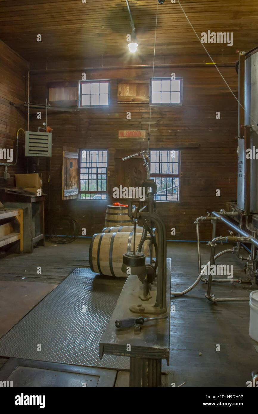Barrel filling operations at craft bourbon distillery Stock Photo - Alamy