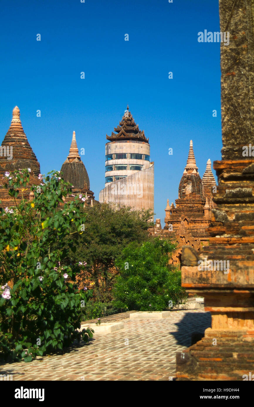 The modern Nan Myint watchtower stands amid ancient temples in Bagan ...