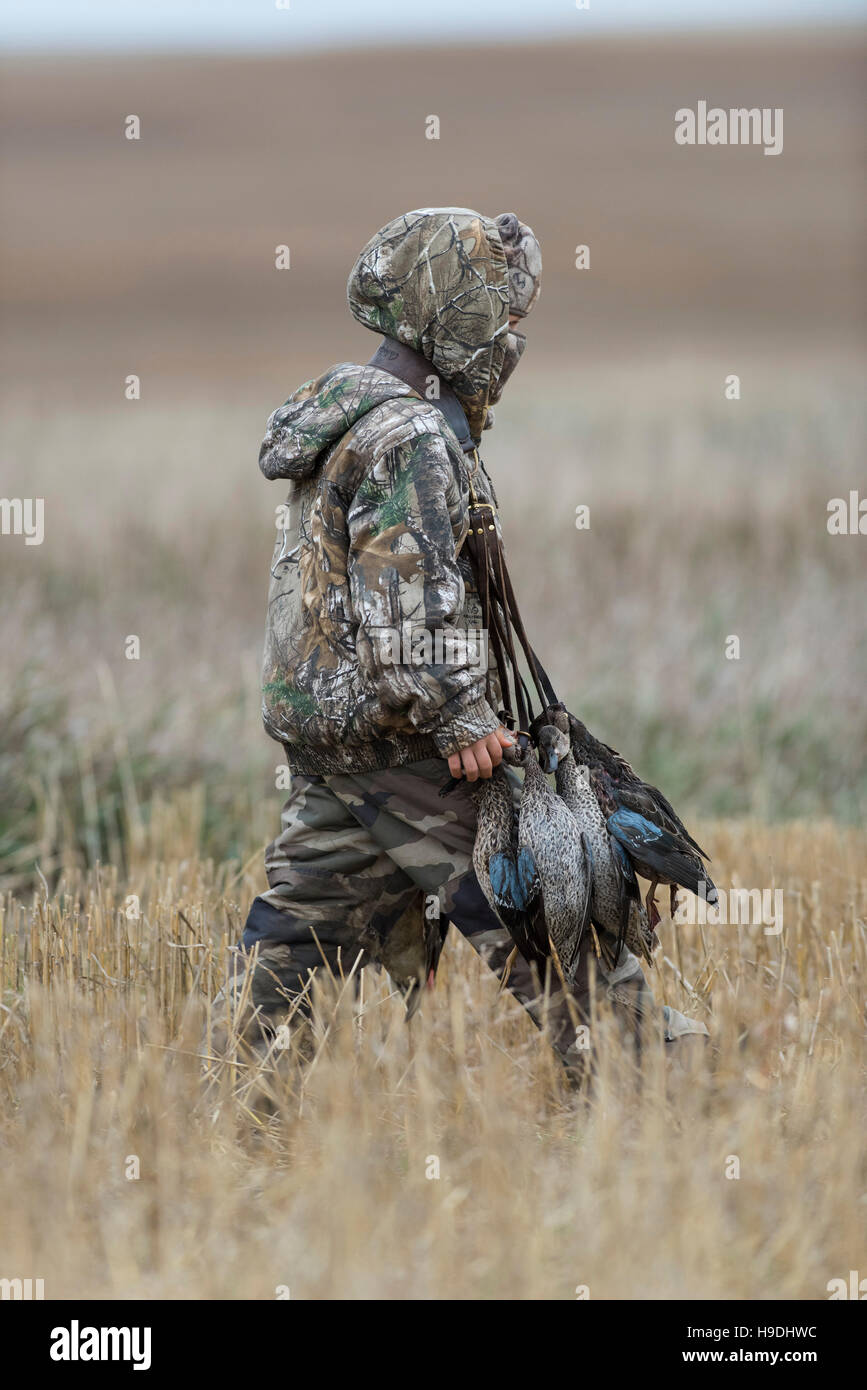 A Young duck hunter with Ducks in North Dakota Stock Photo - Alamy