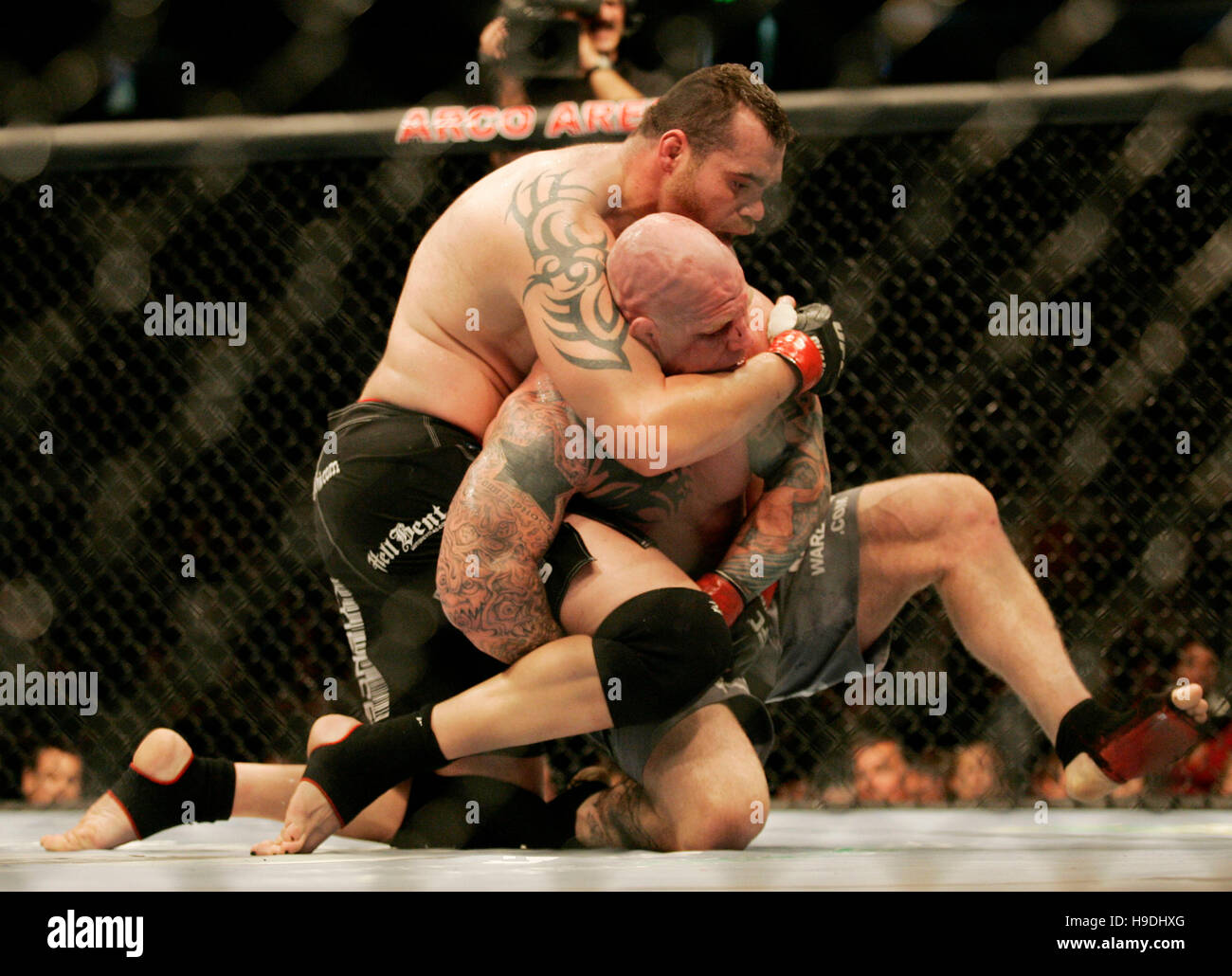 Tim Sylvia, left, fights Jeff Monson during the Ultimate Fighting ...
