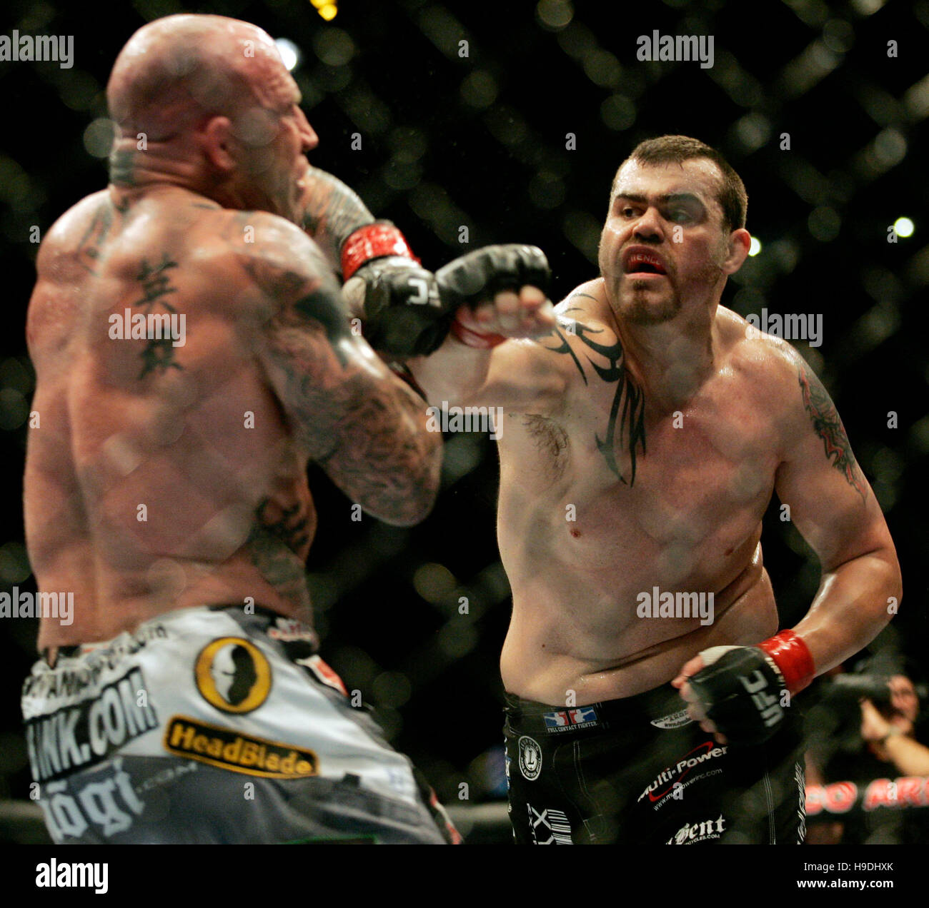Tim Sylvia, right, punches Jeff Monson during Ultimate Fighting ...