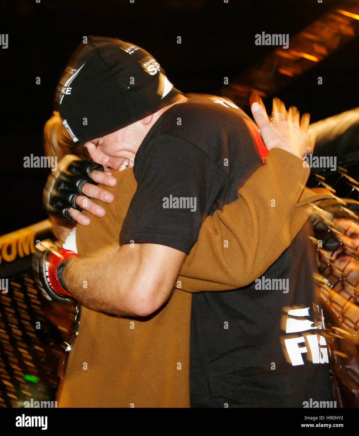 Georges St. Pierre, celebrates his victory over Matt Hughes with his ...