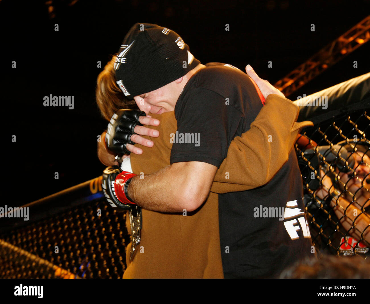Georges St. Pierre, celebrates his victory over Matt Hughes with his ...