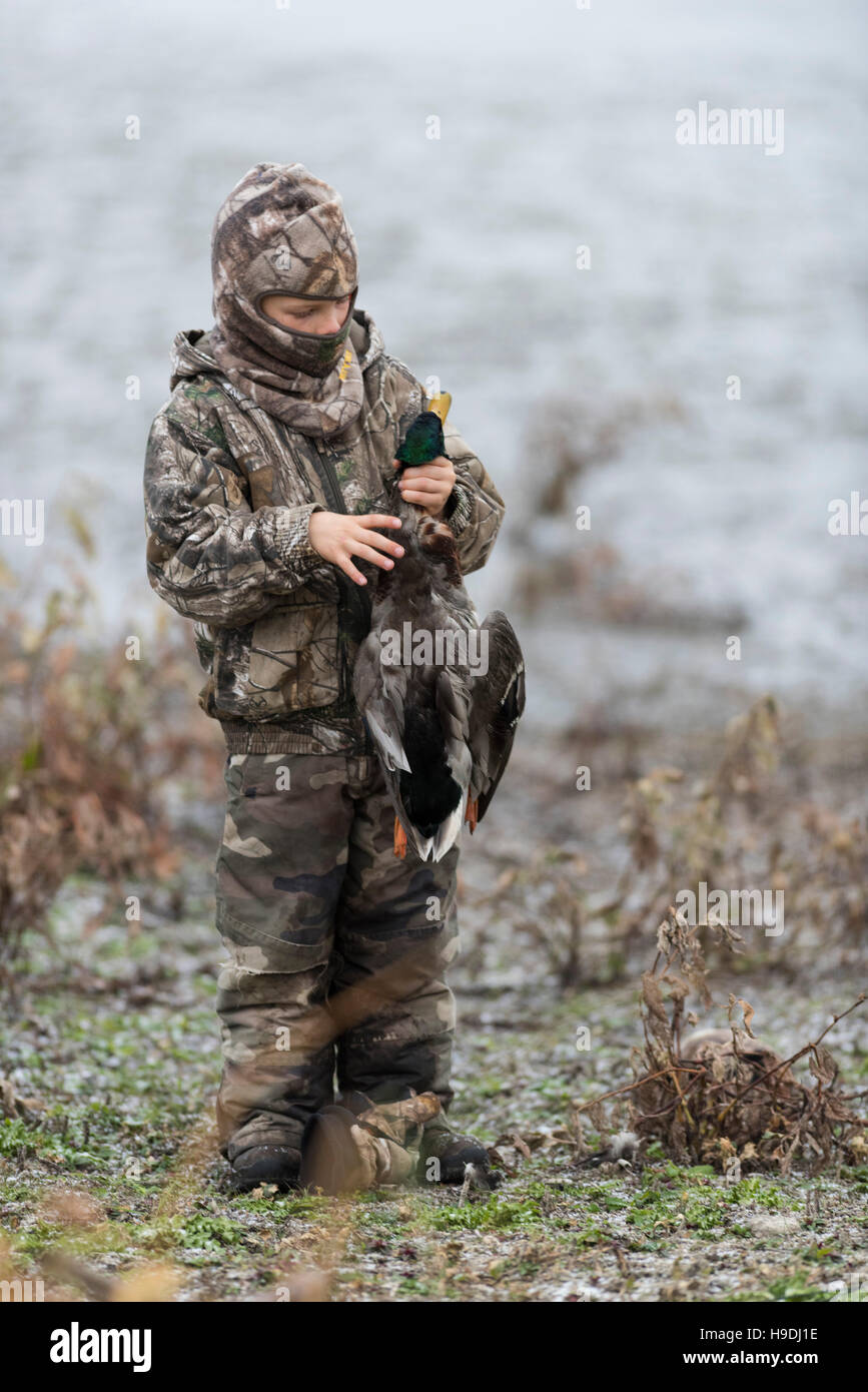 A Young duck hunter with Ducks in North Dakota Stock Photo - Alamy