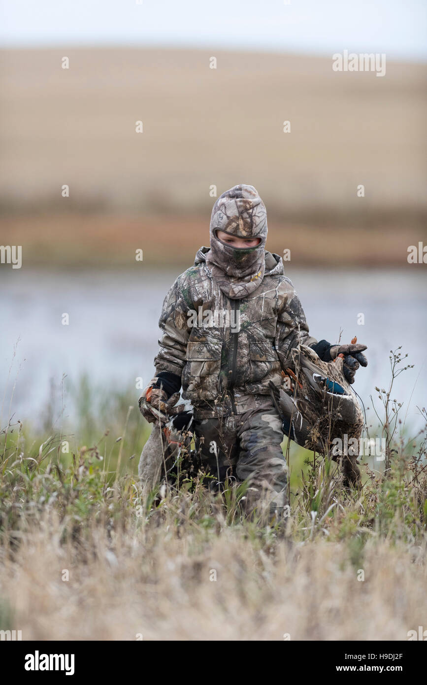 A Young duck hunter with Ducks in North Dakota Stock Photo - Alamy