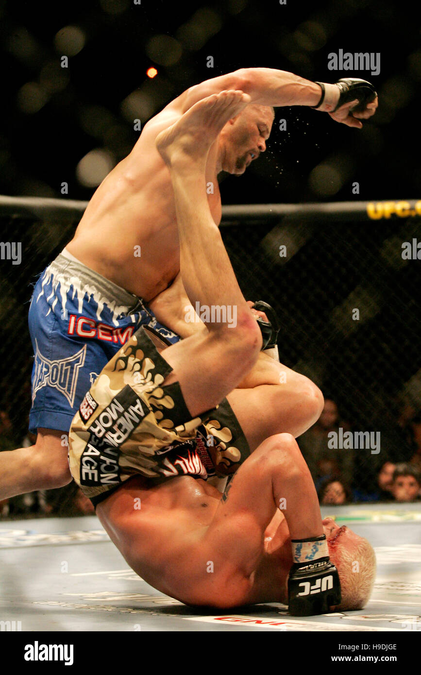 Chuck Liddell, top, punches Tito Ortiz at the Ultimate Fighting ...