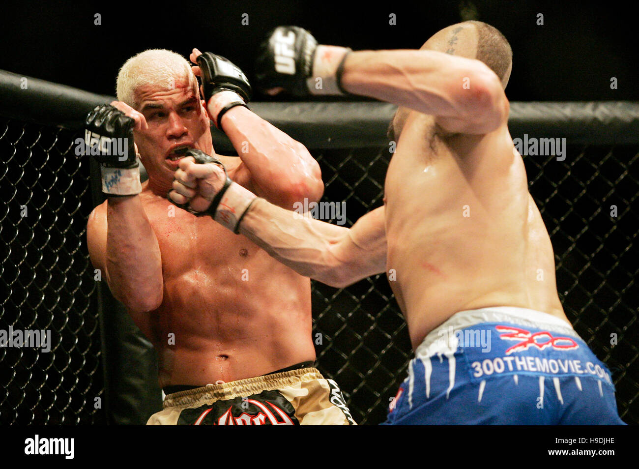 Chuck Liddell, right, punches Tito Ortiz at the Ultimate Fighting ...