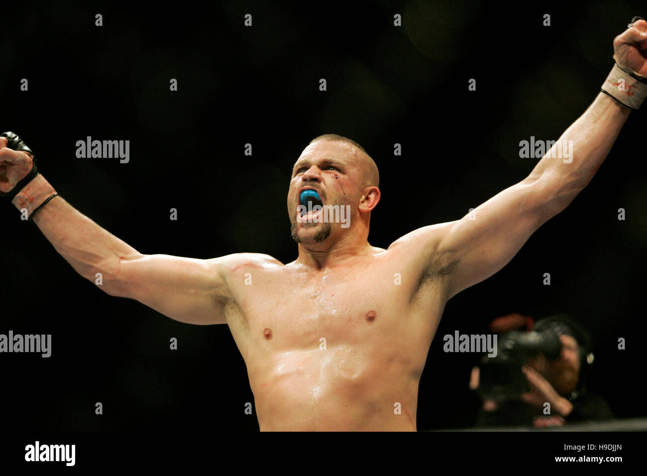 Chuck Liddell celebrates his victory over Tito Ortiz at the Ultimate ...