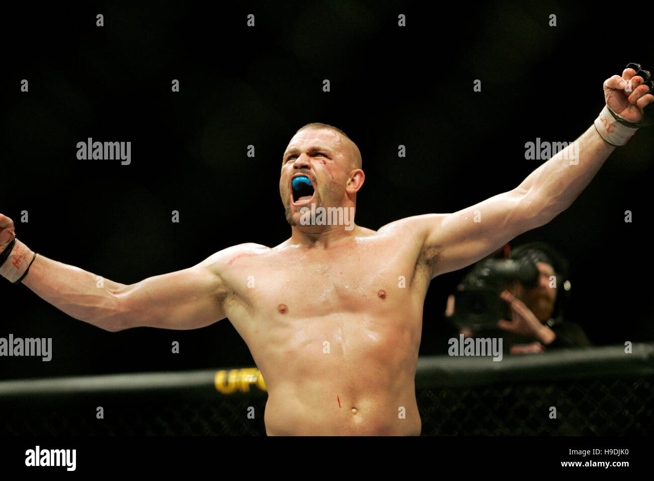Chuck Liddell celebrates his victory over Tito Ortiz at the Ultimate ...