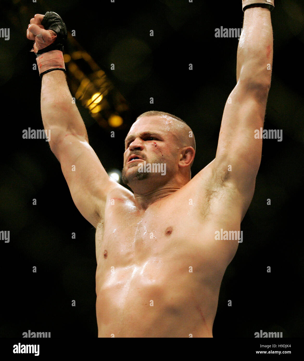 Chuck Liddell celebrates his victory over Tito Ortiz at the Ultimate ...