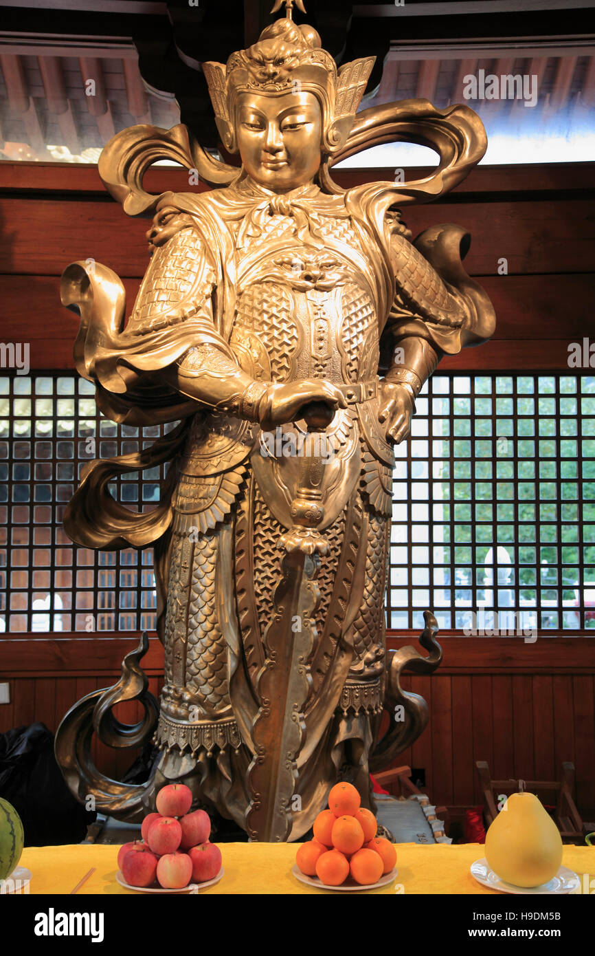 China, Shanghai, Jing'an Temple, interior, statue, offerings Stock ...