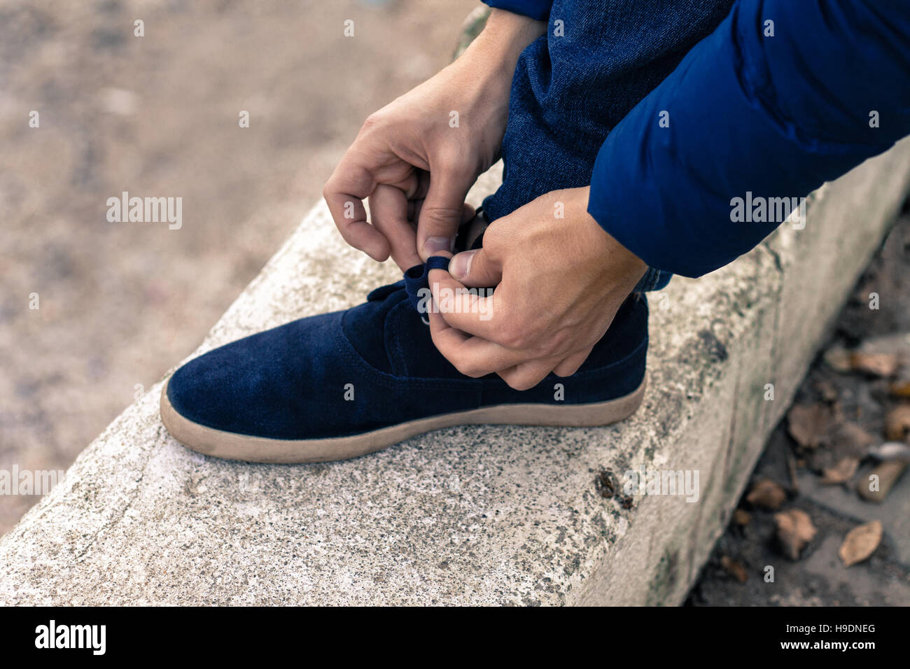 Blue jeans and black sneakers hi-res stock photography and images - Alamy