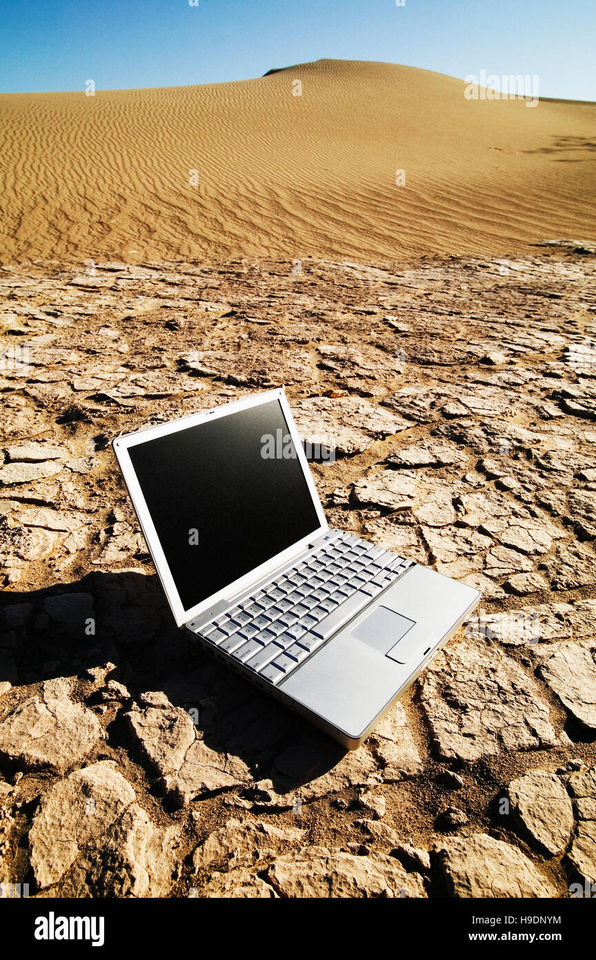 Laptop computer on desert sand hi-res stock photography and images - Alamy