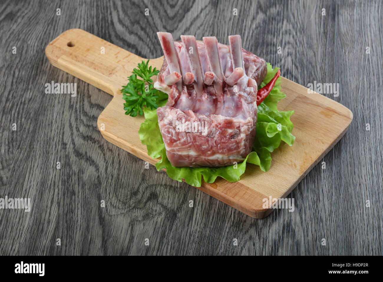Lamb Frenched Rack 4 rib bone Stock Photo - Alamy