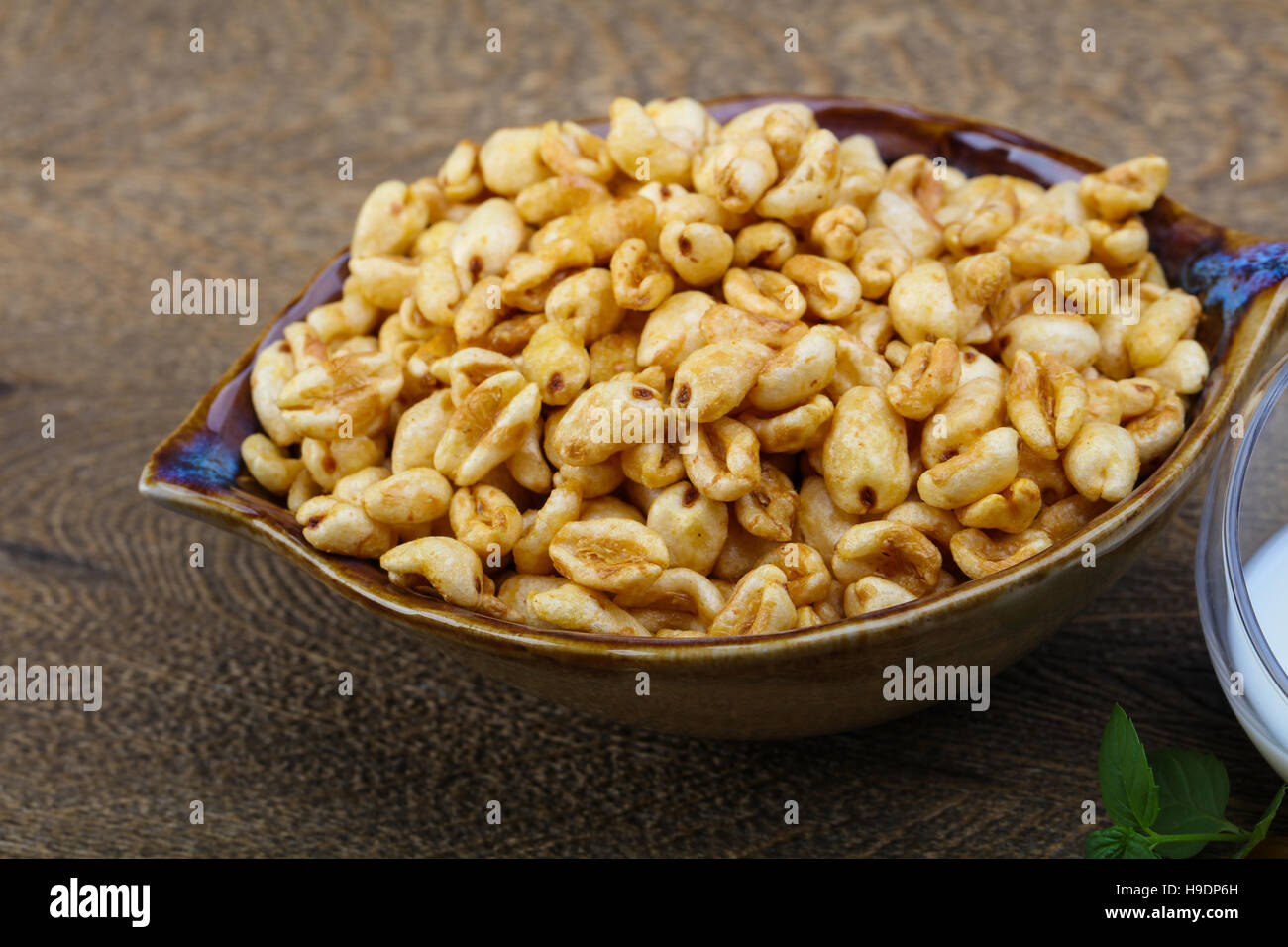 Rise flakes with milk, raisin and mint leaves Stock Photo - Alamy