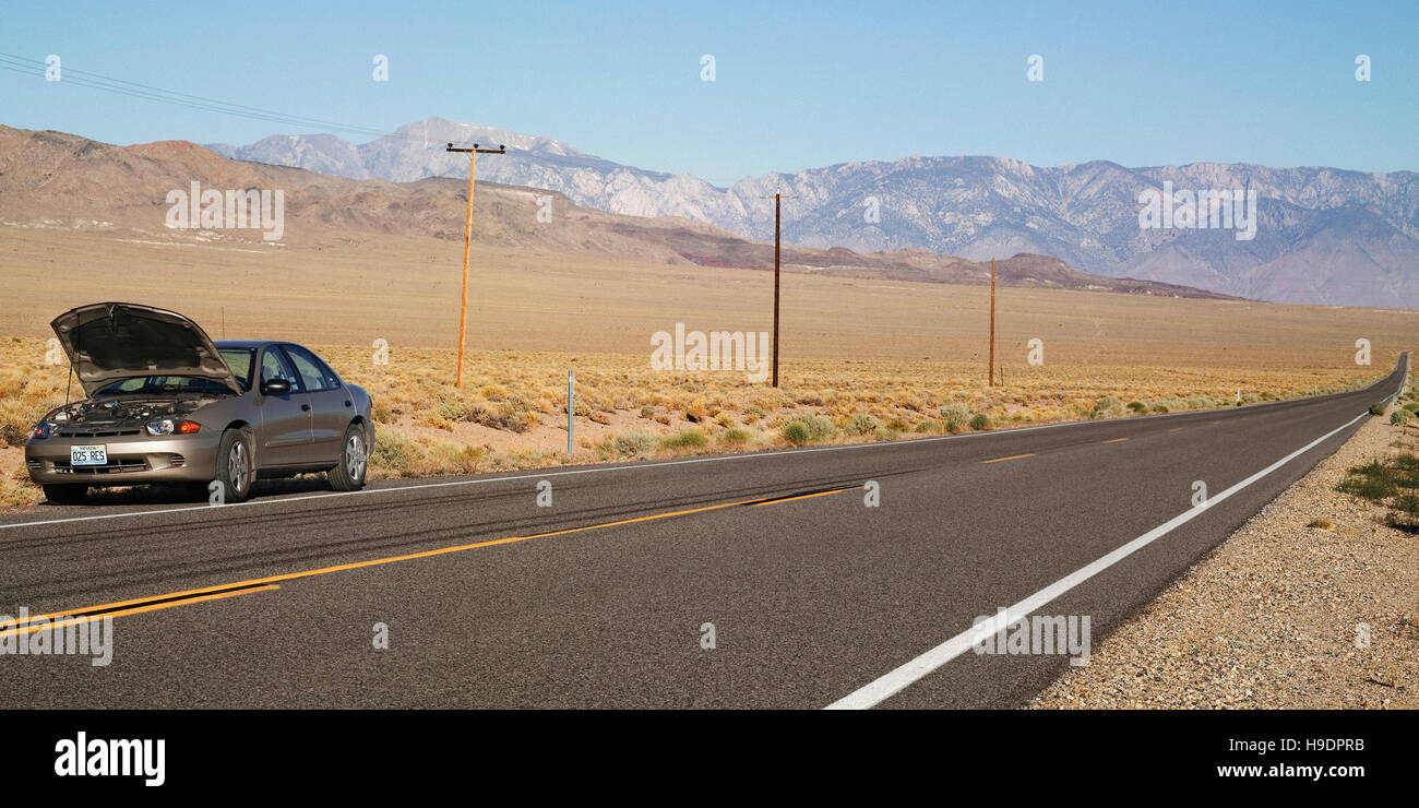 Disabled vehicle on side of road Death Valley California Stock Photo ...
