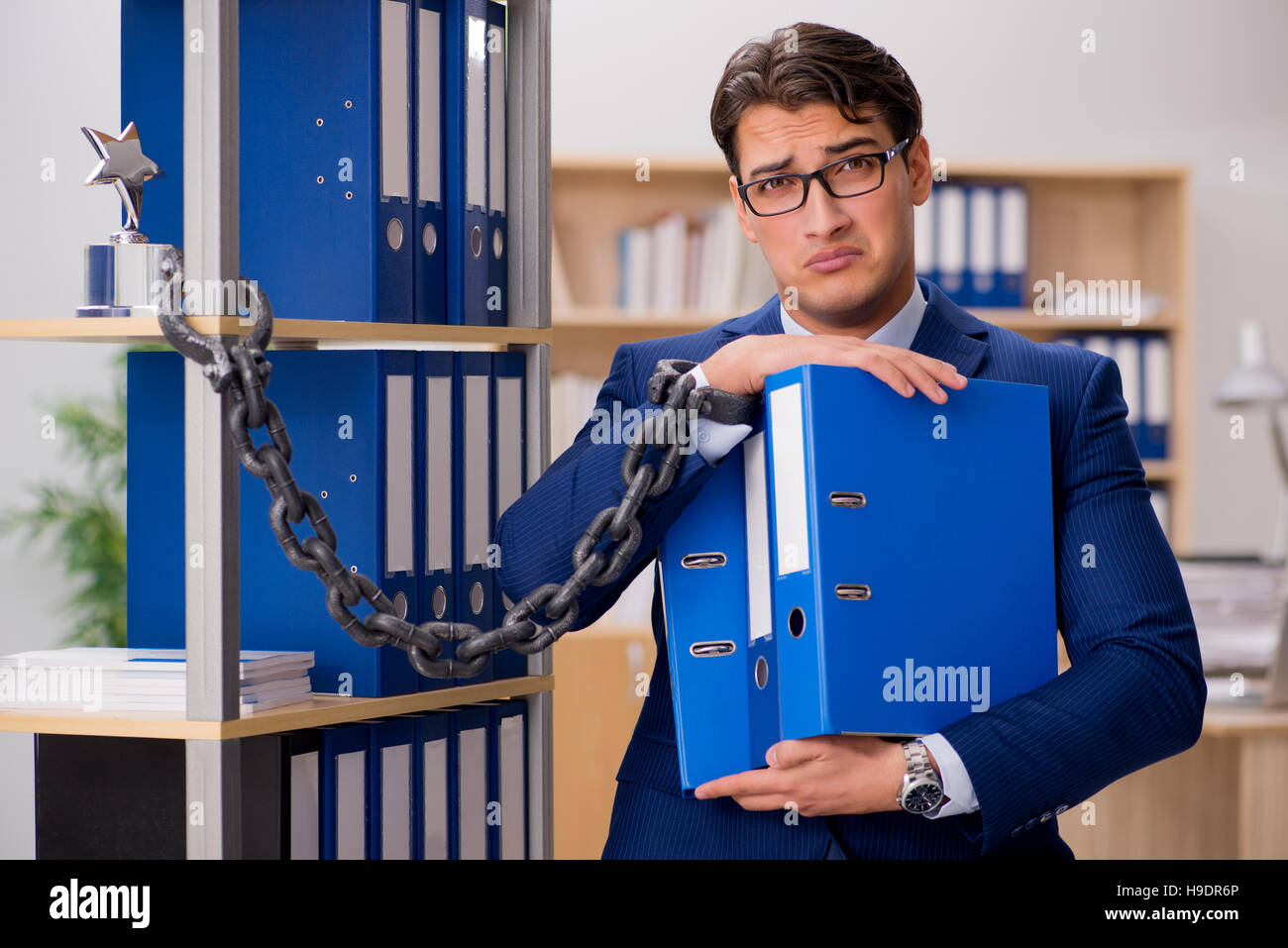 Man chained office hi-res stock photography and images - Alamy
