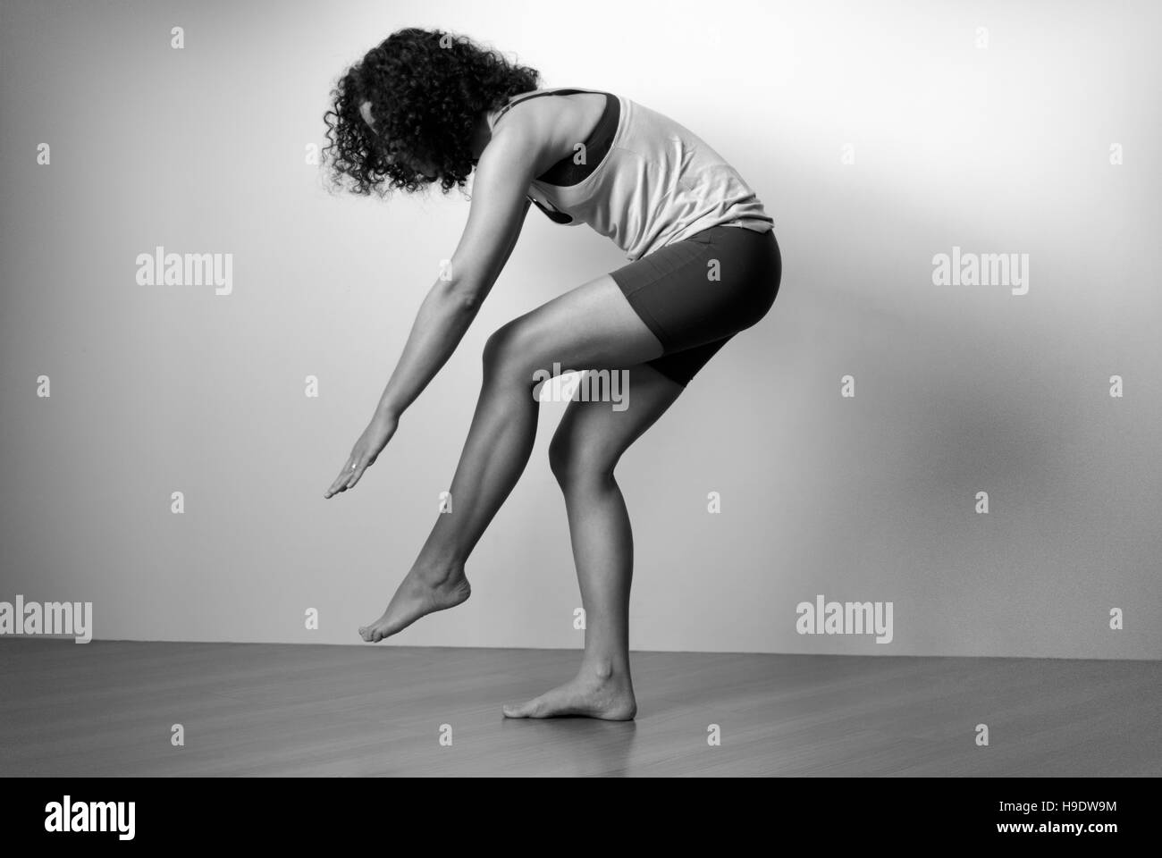 Woman balancing her body Stock Photo - Alamy