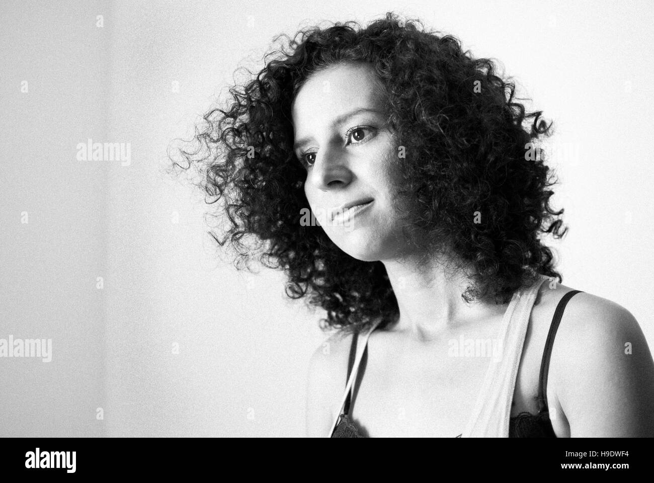 Face of a woman looking forward Stock Photo - Alamy