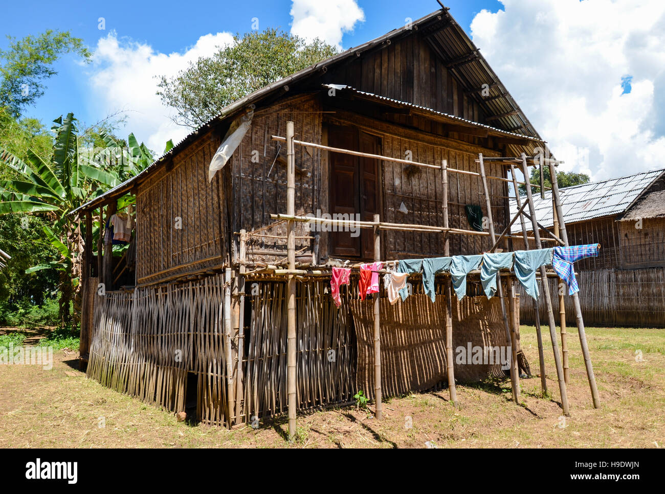 Typical rural landscape in Myanmar with traditional bamboo huts and ...