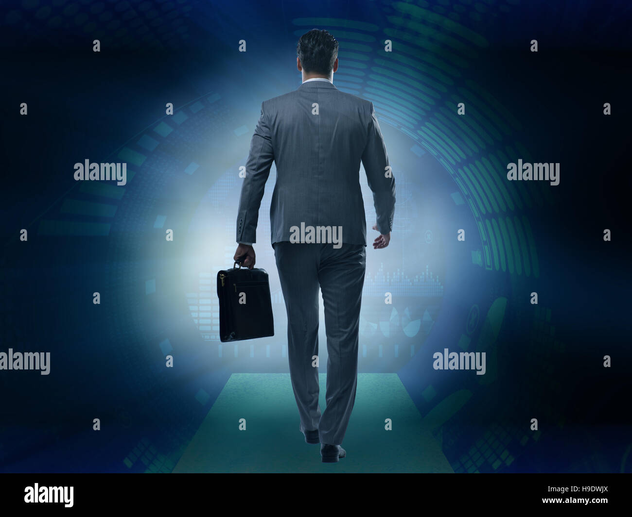 Businessman walking away from the camera Stock Photo - Alamy