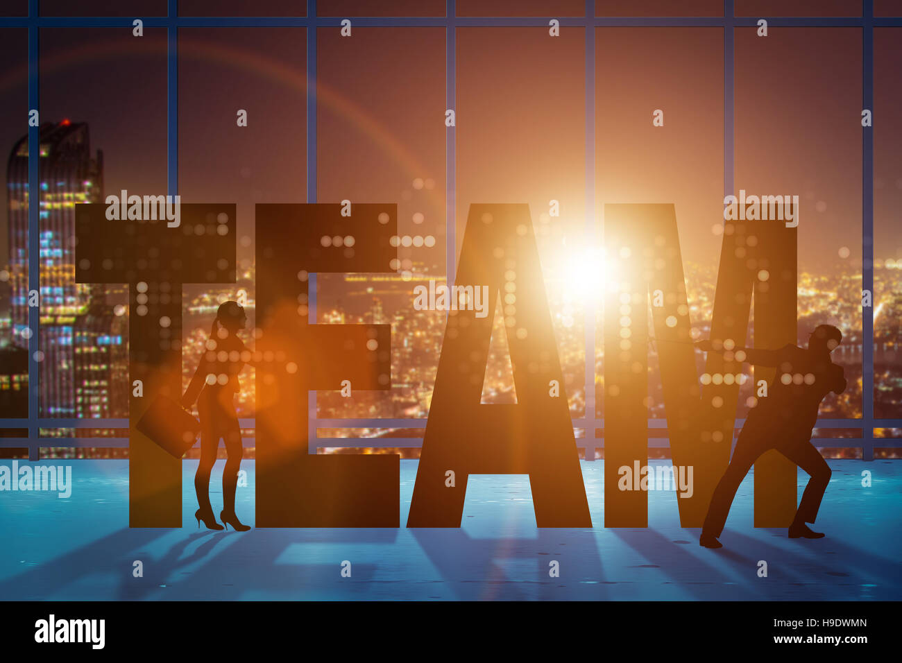 Teamwork concept with the word team Stock Photo - Alamy