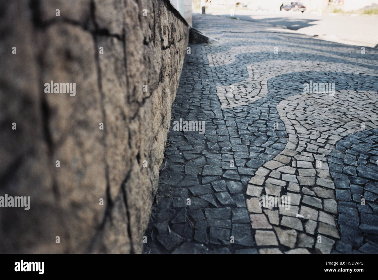 Sidewalk and wall Stock Photo - Alamy