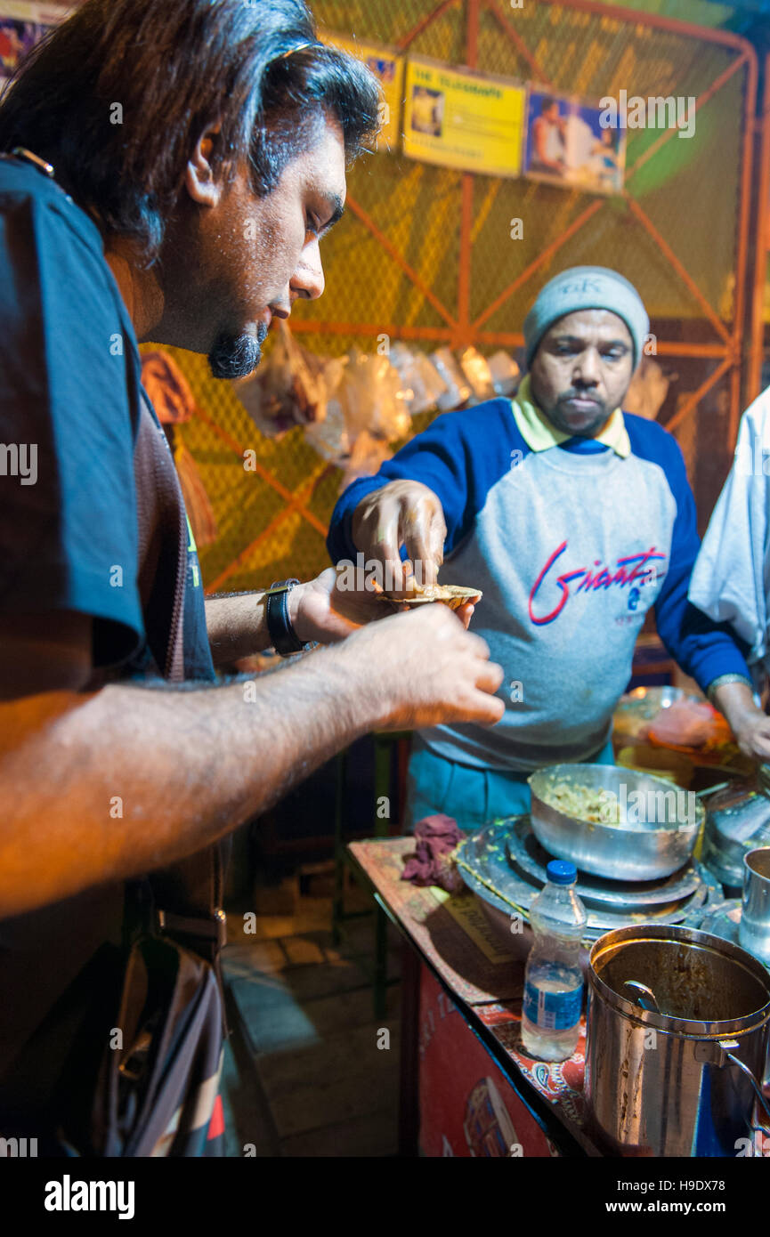 Chef Gaggan Anand eating puchka, savoury shells of semolina pastry ...