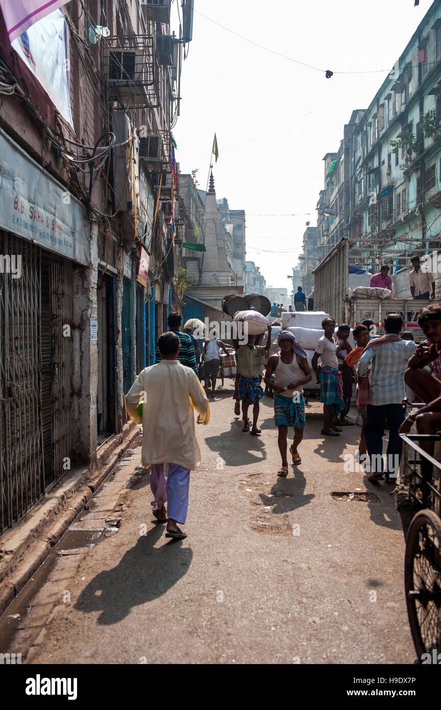 Shoppers and goods carriers at Burra Bazar, otherwise known as Bara ...