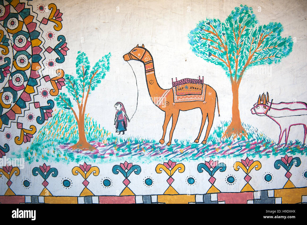 A painting of every day village life the inside wall of a Meghawal ...