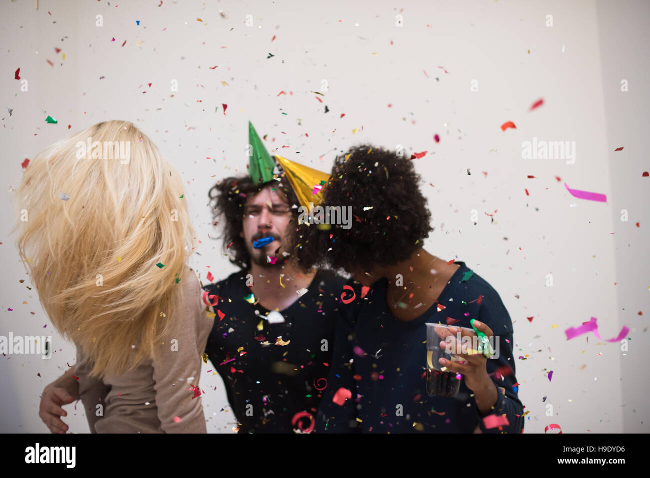 confetti party happy young people group celebrating new year eve while ...