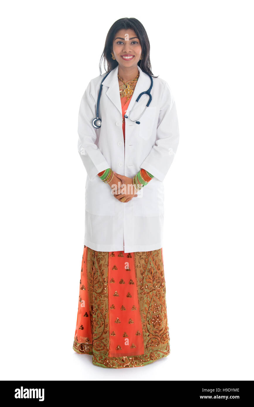 Full length Indian female medical doctor standing isolated on white ...
