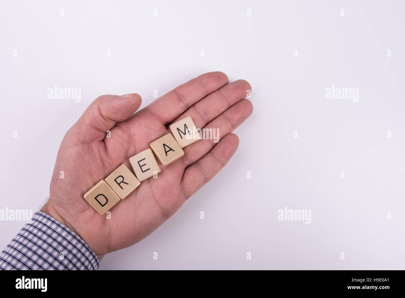 the word "dream" in one hand Stock Photo - Alamy