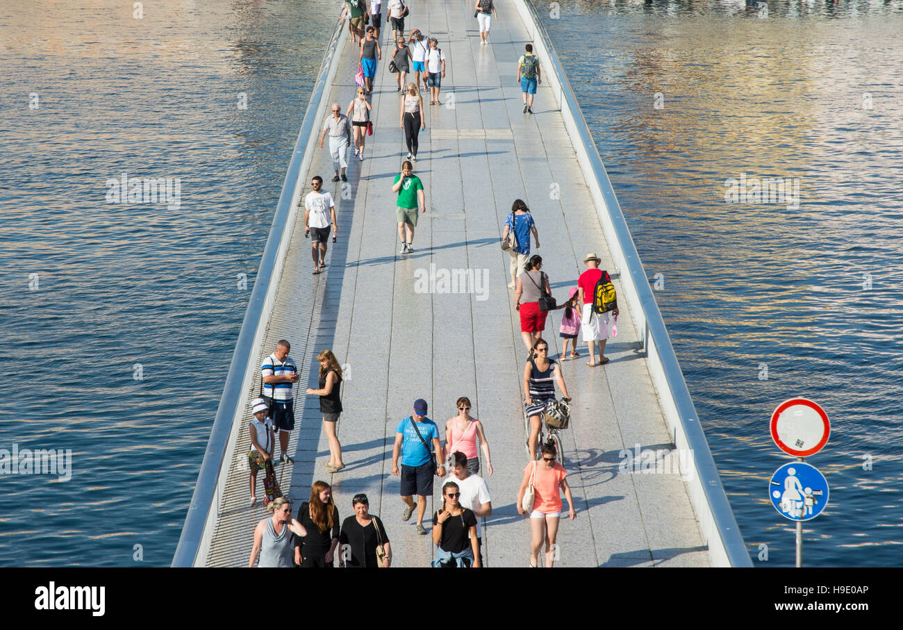 People walking over a bridge in Zadar Stock Photo - Alamy